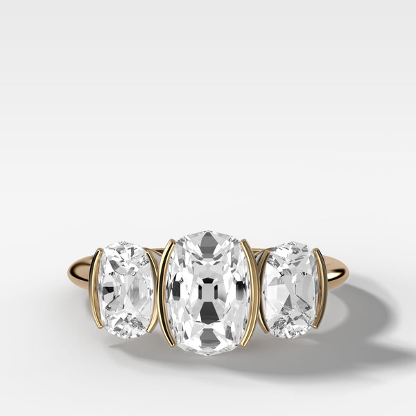 Half Bezel Triad Engagement Ring With Elongated Old Mine Cut Diamonds ...