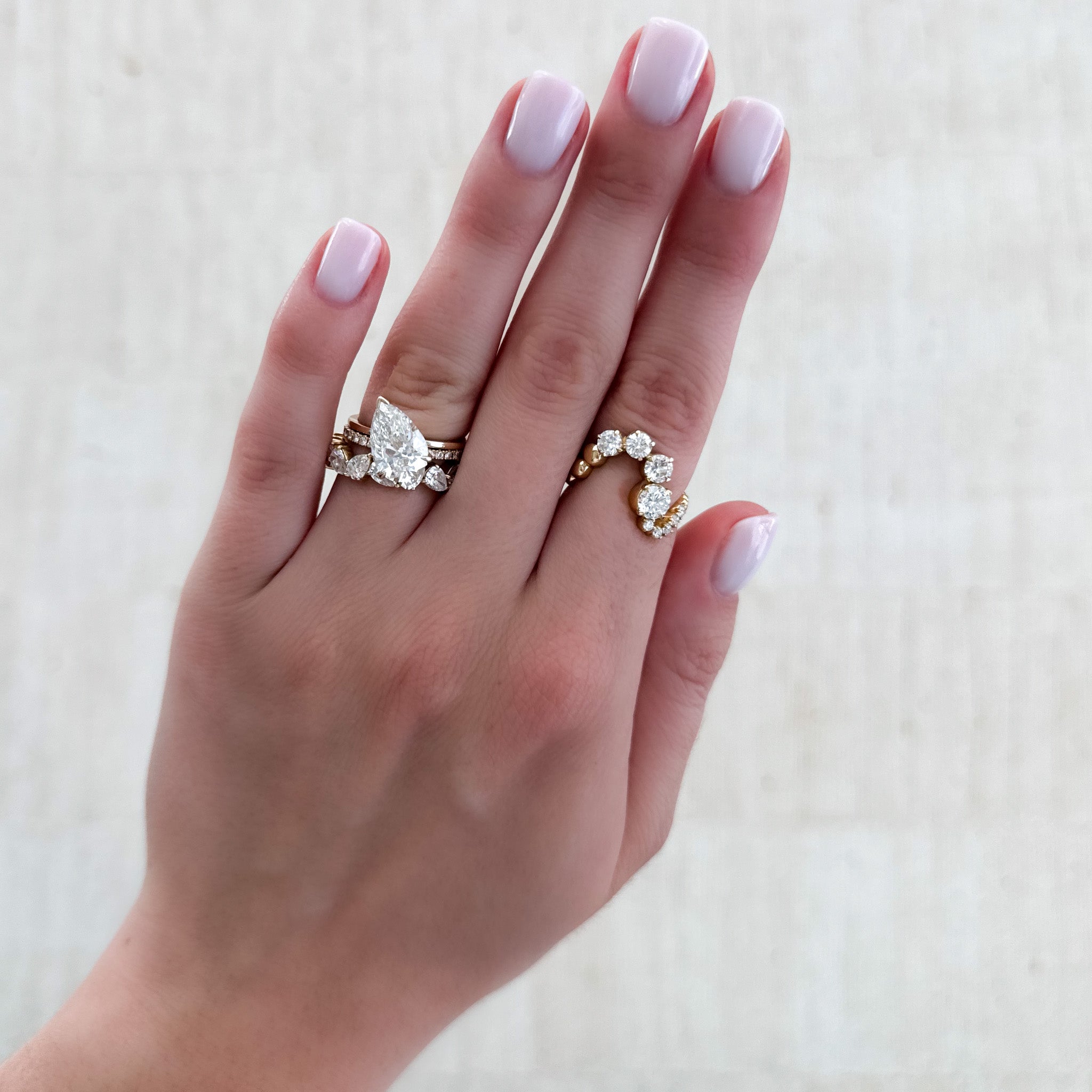 Pear Tilted Thin + Simple Solitaire Engagement Ring | GOODSTONE | GOODSTONE