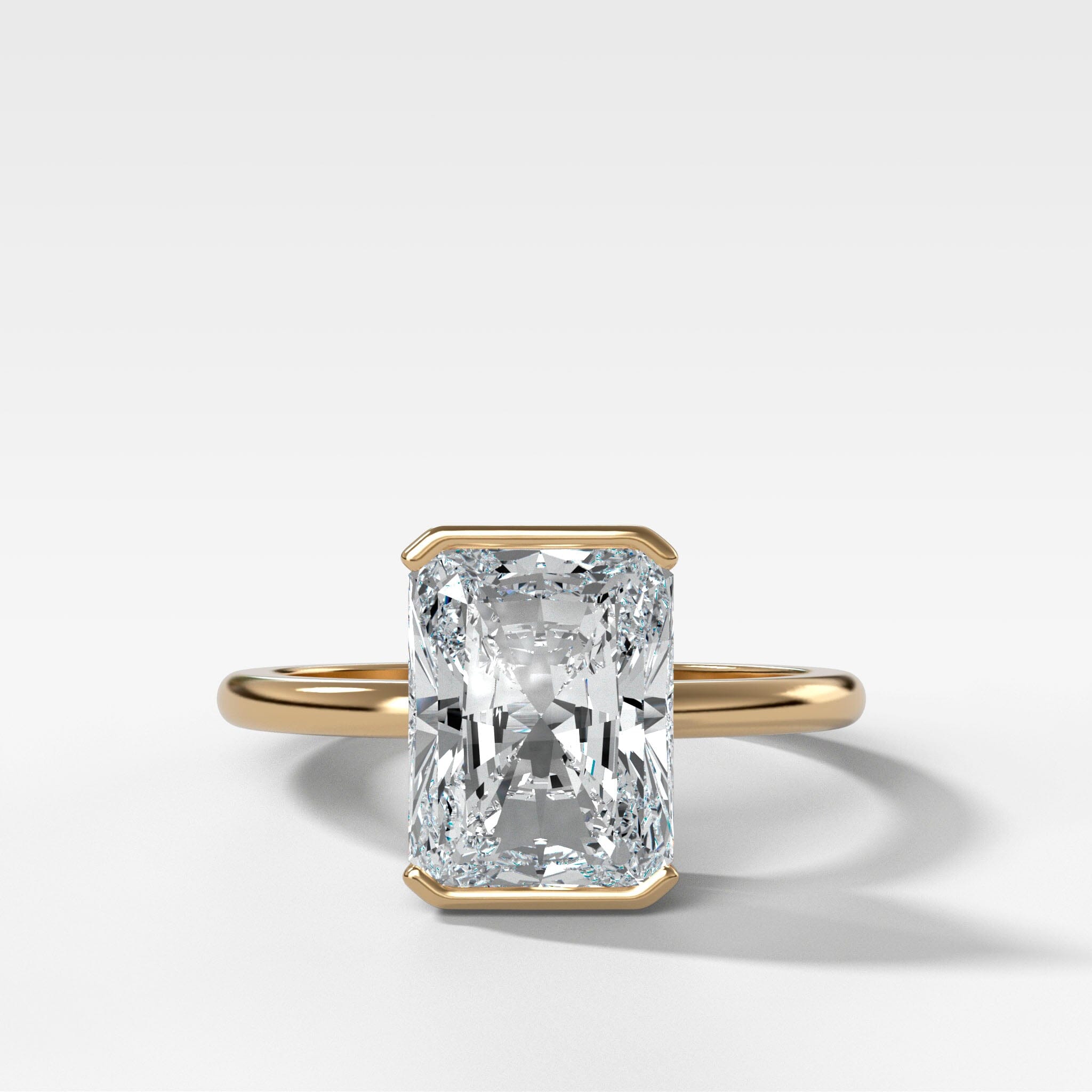 North South Half Bezel Solitaire Engagement Ring With Elongated Radian