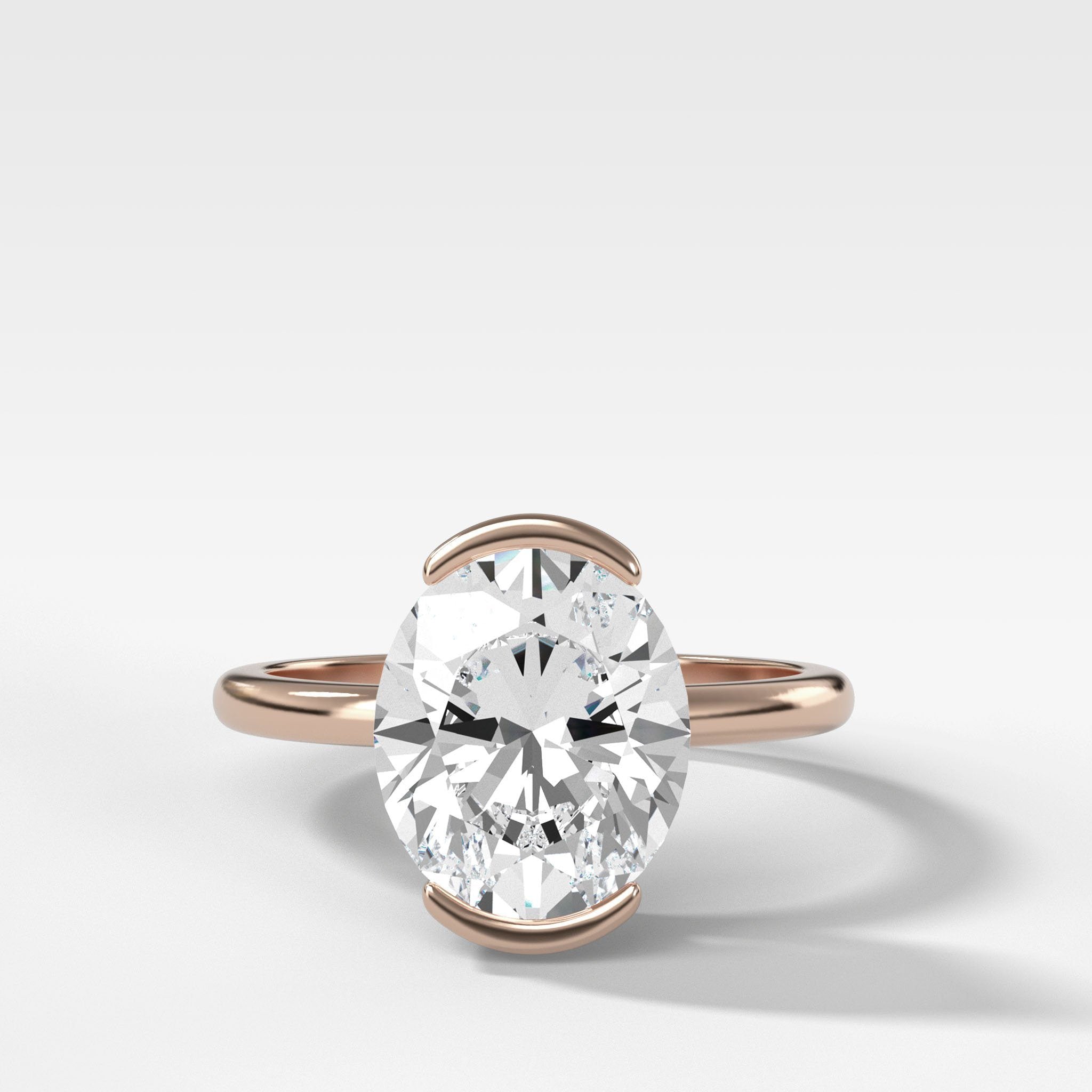 North South Half Bezel Solitaire Engagement Ring With Oval Cut Diamond ...