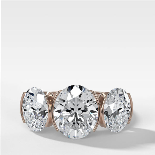 Half Bezel Triad Engagement Ring With Oval Cut Diamonds | GoodStone
